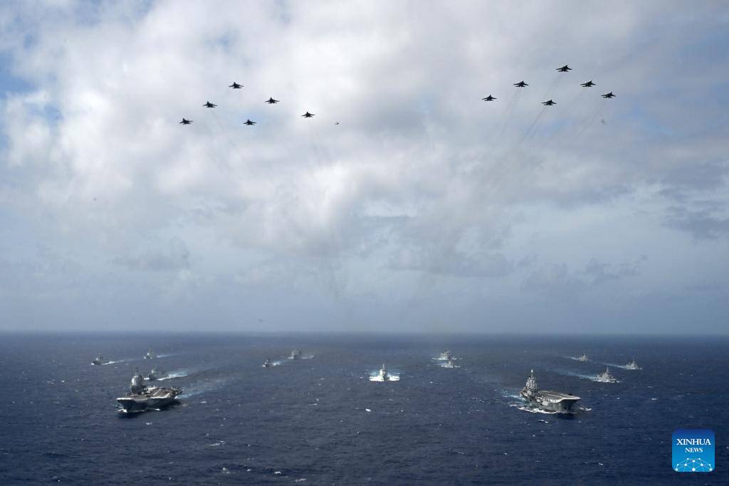 Chinese navy conducts dual aircraft carrier formation exercise for ...